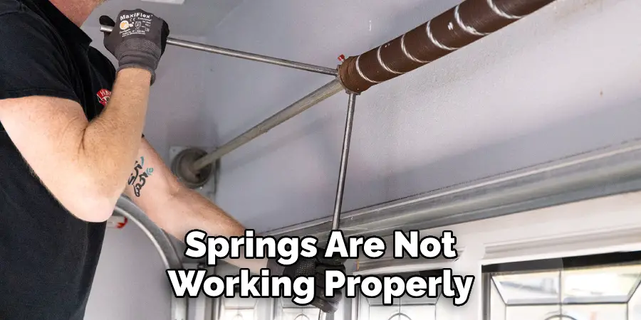 How to Tell if Garage Door Spring Is Broken | 8 Ways (2022)